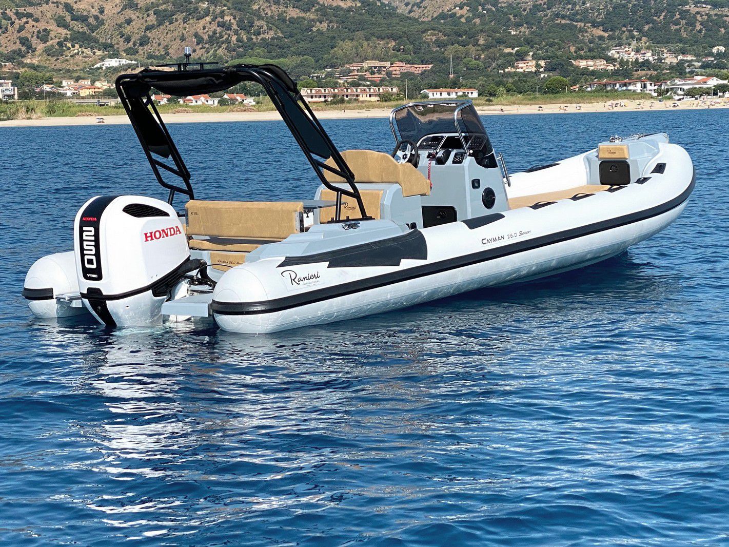 Outboard inflatable boat - CAYMAN 26 - Ranieri - rigid / center console ...