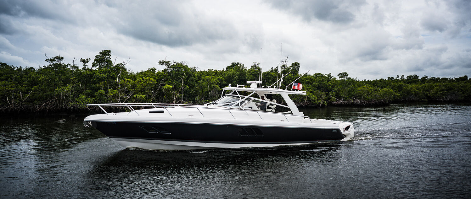 Outboard express cruiser - 475 SPORT YACHT - Intrepid - triple-engine ...