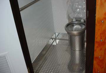 Floating restroom - Topper Industries