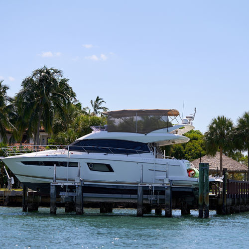 Boat lift - Golden Boat Lifts & Marine Systems - dock-mounted / aluminum